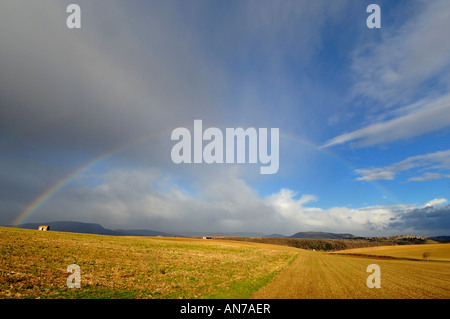 Rainbow over countryside, Region Auvergne, France, Europe Stock Photo ...