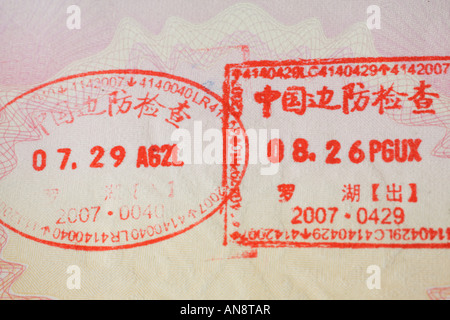 Close Up Of Chinese Entry And Exit Stamp With Tourist Visa In Passport ...