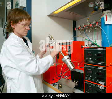 Scientist working with sample in laboratory Stock Photo - Alamy
