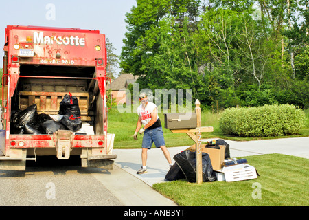 Local Neighbourhood rubbish collection workers pick up household trash ...