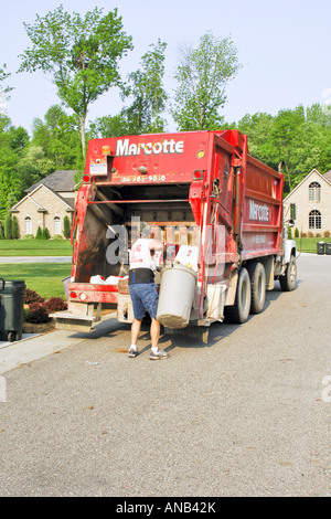 Local Neighbourhood rubbish collection workers pick up household trash ...
