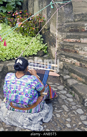 GUATEMALA ANTIGUA Cakchiquel Mayan woman wearing traditional huipil and ...