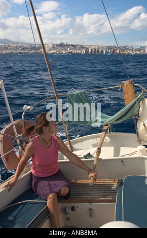 Young woman relaxing on sailing boat, British Virgin Islands Stock ...