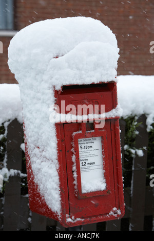royal mail postbox covered in heavy snowfall Stock Photo - Alamy