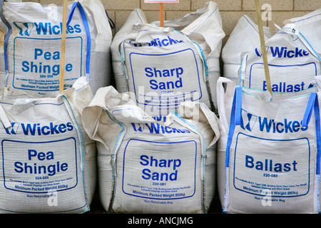 wickes sharp sand building materials in bags outside store england uk ...