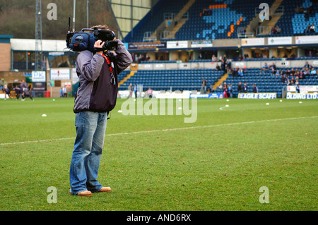 Television Cameraman filming a Football match. Picture by James ...