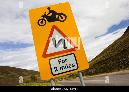 Dangerous bend warning sign in road with arrow signs in rolling Stock ...