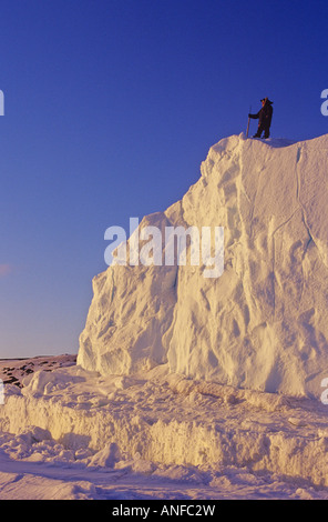Inuits and iceberg, Arctic Canada Stock Photo - Alamy