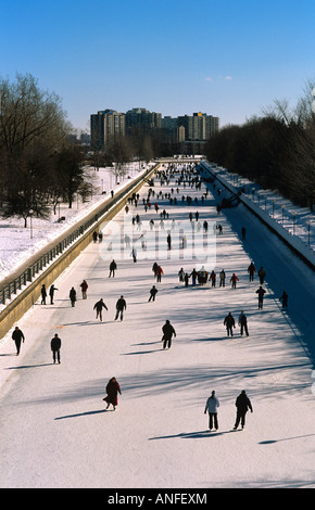 Skaters skate along the Rideau Canal Skateway during the first official ...