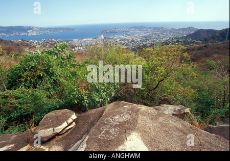 Pre-Columbian petroglyphs with the city of Acapulco and Acapulco Bay in ...