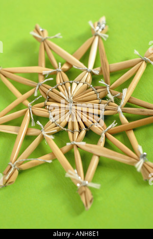 Straw star as a Christmas tree decoration on a white background Stock ...