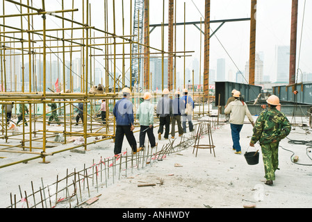 Construction workers leaving for lunch at construction site Stock Photo ...
