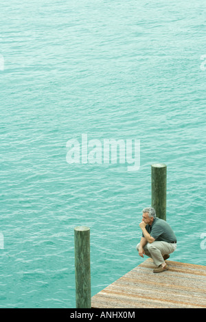 A high angle shot of a wooden dock over a lake Stock Photo - Alamy