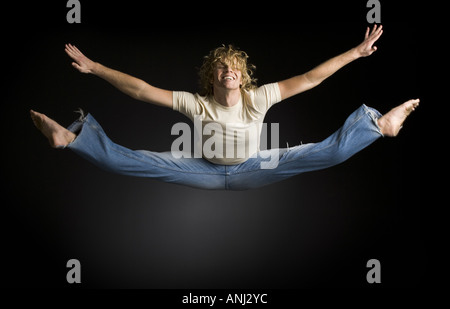 Young man doing splits in the air Stock Photo: 25820686 - Alamy