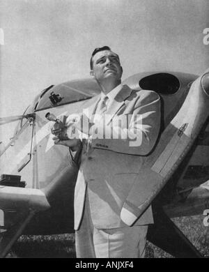 Kenneth Arnold stands beside his private aircraft, which he was flying ...