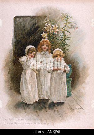 Carol Singing Girls Stock Photo - Alamy