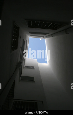 Narrow gap between tall buildings, Paris Stock Photo - Alamy