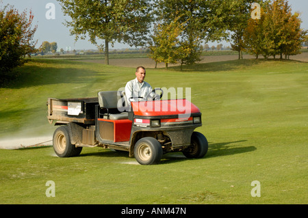 Golf course maintenance, sanding the Fairway Stock Photo - Alamy