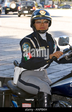Female police officer riding a motorcycle in Mexico City Mexico Stock ...