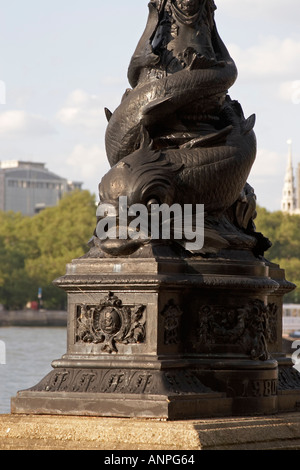 Dolphin sculpture detail on base of street lamps on Queen s Walk by ...