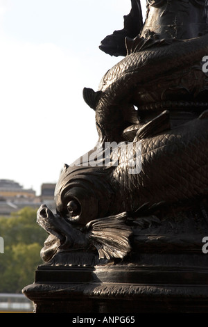 Dolphin sculpture detail on base of street lamps on Queen s Walk by ...