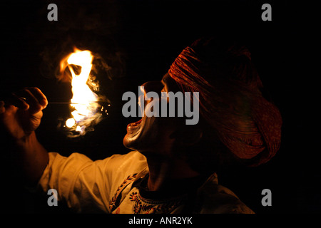 Indian fire-eater with turban Stock Photo - Alamy