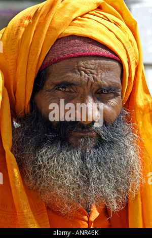 Close up of an Old Indian sadhu (saint), priest with white beard and ...