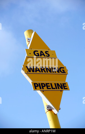 Warning sign for buried pipeline in desert, New Mexico, USA Stock Photo ...