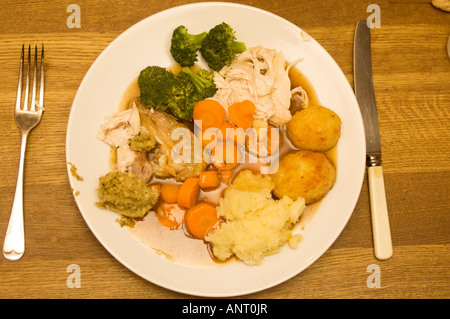 traditional british 'meat and two veg' roast pork sunday dinner on ...