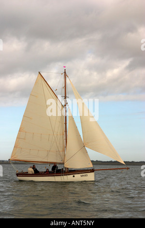 Traditional gaff rigged sailing boat (yacht) sails during sail club ...
