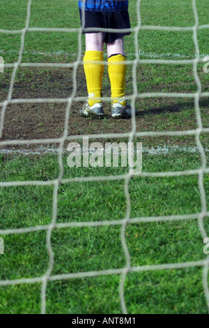 Goal keeper protecting the net Stock Photo - Alamy