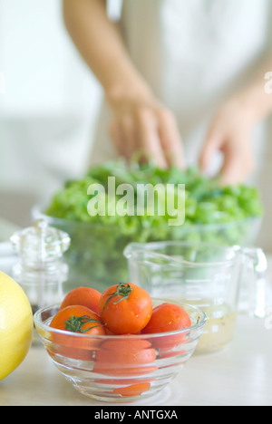 Midsection of woman preparing food Stock Photo - Alamy
