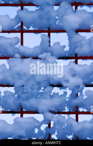 Fence covered in snow, pattern winter background Stock Photo - Alamy