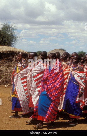 Maasai women walking, group, traditional dress, white beaded round ...