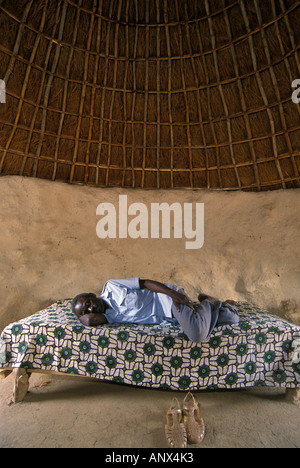 Bed in traditional, tribal hut of Kenyan people, Nairobi Stock Photo ...