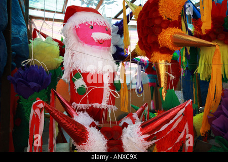 Piñatas hang in a stall in Zihuatanejo Mexico Stock Photo - Alamy