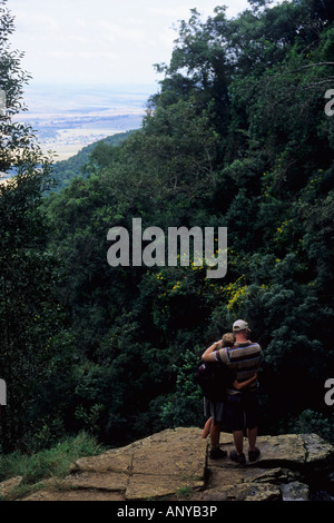 Young couple in love over isolated background happy face smiling with ...