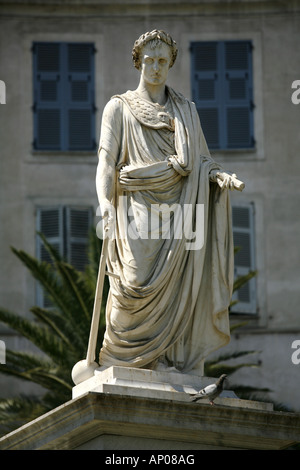 A white marble statue of Napoleon on Place Foch with ornamental lions ...