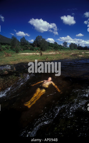 Man floating down river Queensland Australia 2627 Stock Photo - Alamy