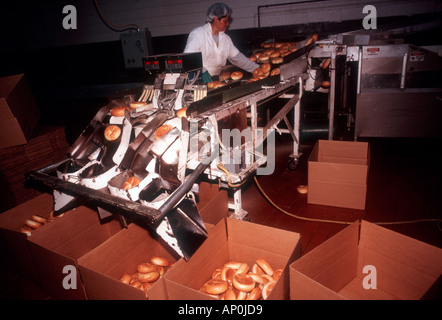 Workers and machinery at the JJ Cassone Bakery in Port Chester NY Stock ...
