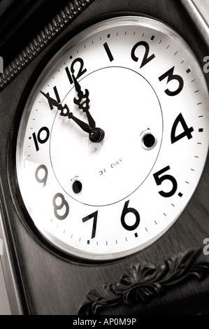 Clock showing 12 noon Stock Photo - Alamy