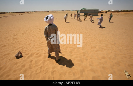Refugee children playing football Stock Photo - Alamy