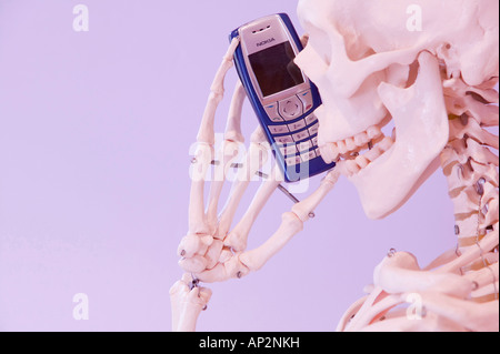 A human skeleton talking on a mobile phone Stock Photo - Alamy