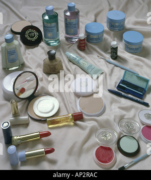 Different makeup cosmetics on white background, top view Stock Photo ...