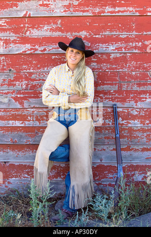 cowgirl at a barn, USA, Oregon Stock Photo - Alamy