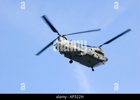A chinook military helicopter flying directly overhead Stock Photo - Alamy