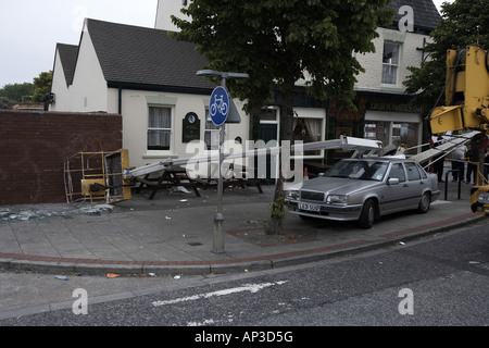 The cherry picker crane that collapsed onto a car outside the ...