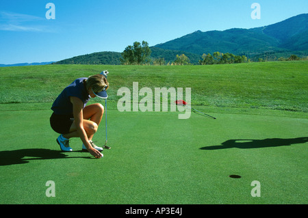 Golfer putting Haymaker golf course Steamboat Springs Colorado USA ...