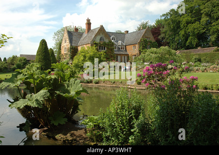 Coton Manor, a 17th century manor house, surrounded by landscaped ...