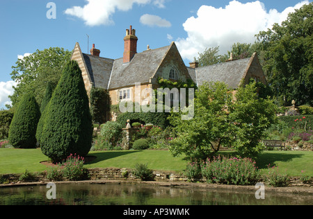 Coton Manor, a 17th century manor house, surrounded by landscaped ...